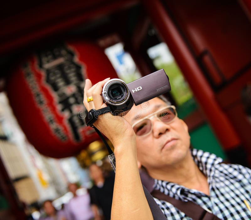 Seniors Tourist Holding a Video Camera Stock Photo - Image of adventure ...