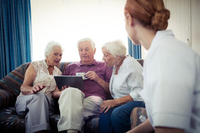 Seniors Using a Tablet Computer Stock Photo - Image of citizen, adult ...