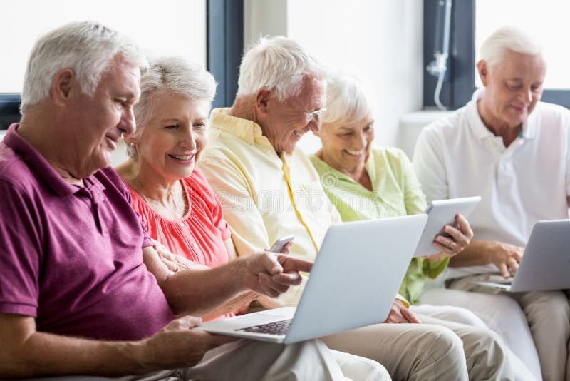 Seniors and technology stock image. Image of retirement - 15717743