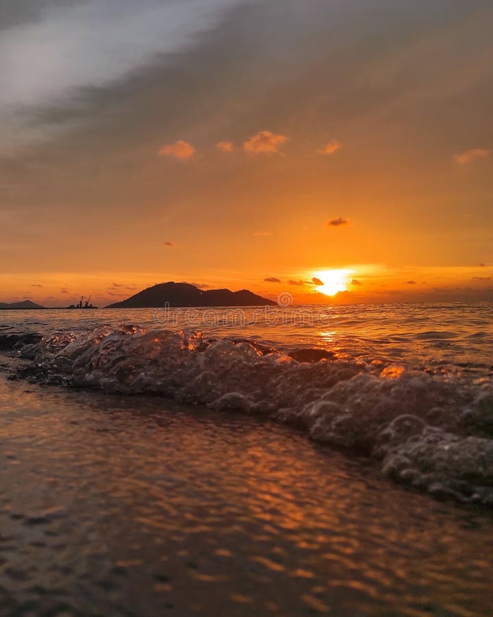 Senja Sunset on the Beach with a Beautiful Wave Ocean Sky Orange Stock ...