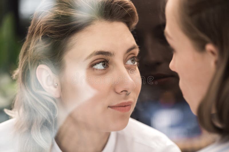 Sensual Lesbian Couple Able To Kiss Isolated on Grey Stock Image ...