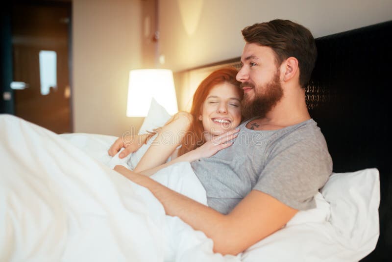 Sensual Couple in Bed Being Romantic Stock Photo - Image of intimate ...
