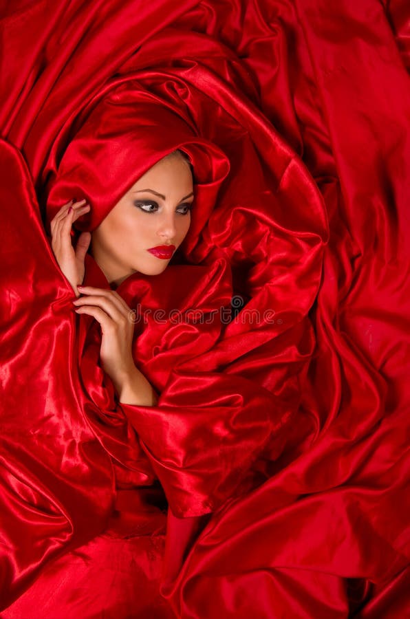 Sensual Face in Red Satin Fabric Stock Image - Image of sensual, silk ...