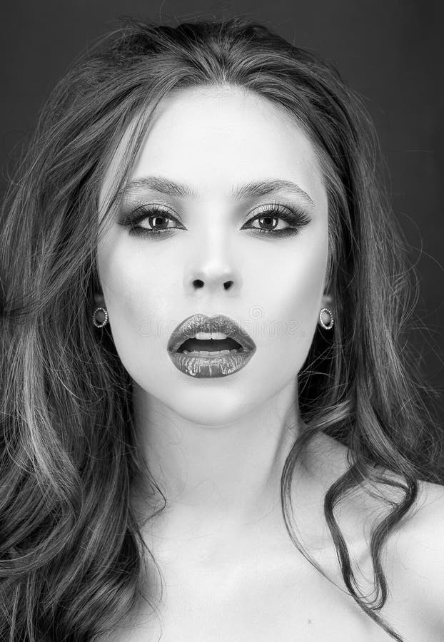 Sensual Woman With Red Lips Black Eyes Makeup Closeup Face Of Fashion