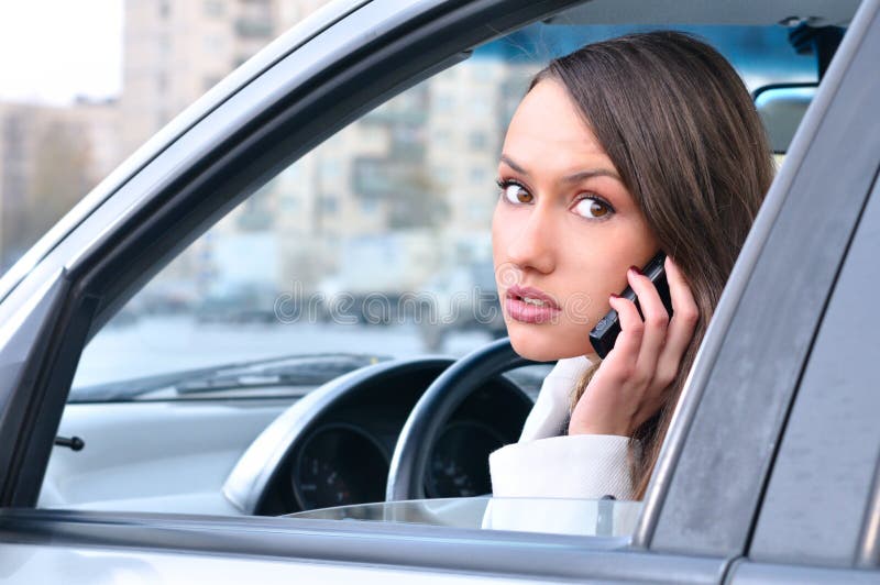 Sensual Young Woman is Talking Phone in Car Stock Photo - Image of ...