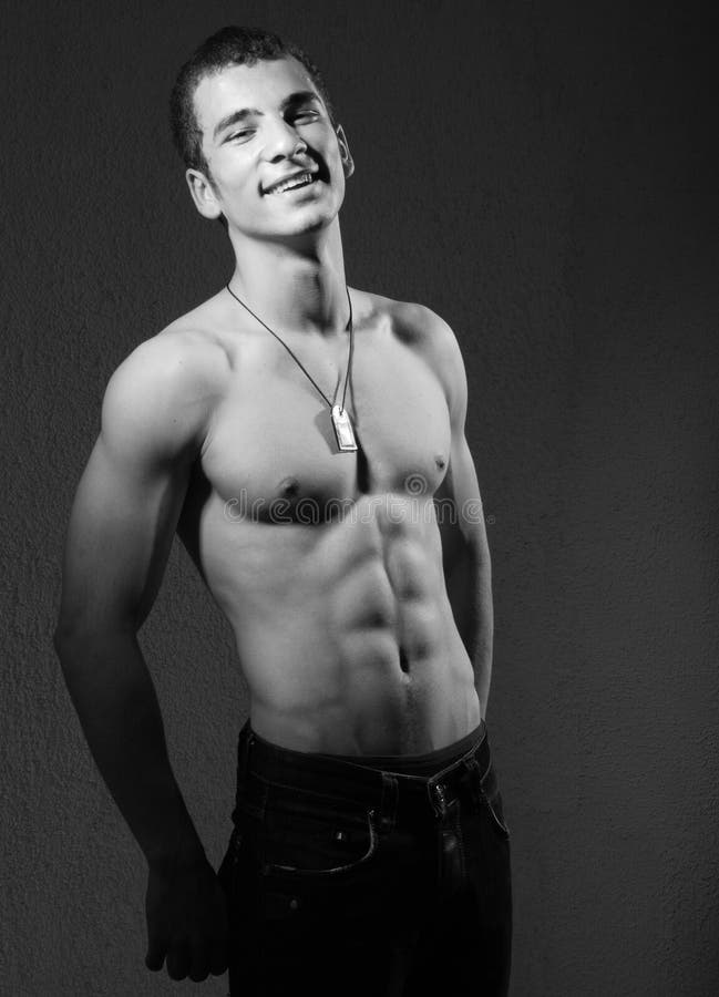 Sent by the Devil stock image. Image of masculinity, muscle - 10934433