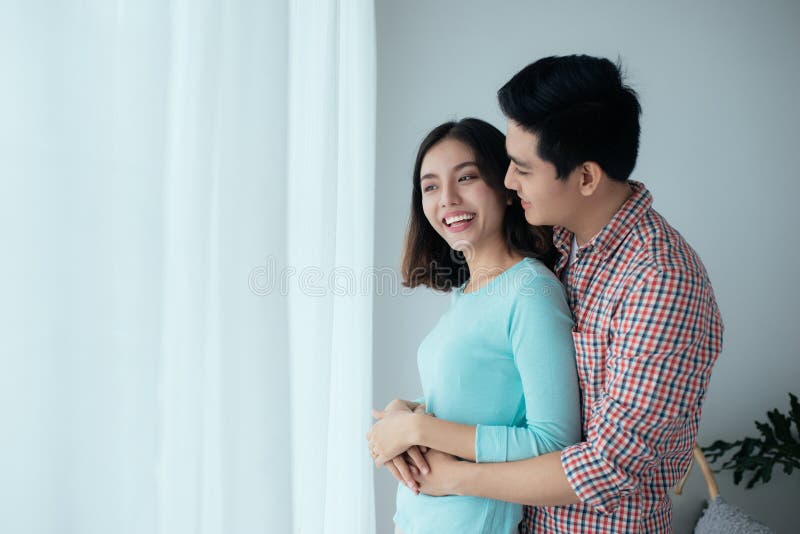 Sentimental Happy Asian Couple in Love Bonding Stock Photo - Image of ...