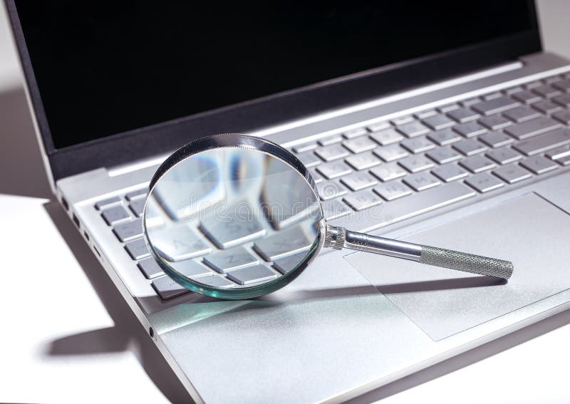 SEO Search Concept with Magnifying Glass on a Website. Web Research and ...