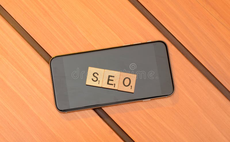 SEO Theme, Wooden Text Box with Smart Phone Stock Image - Image of ...