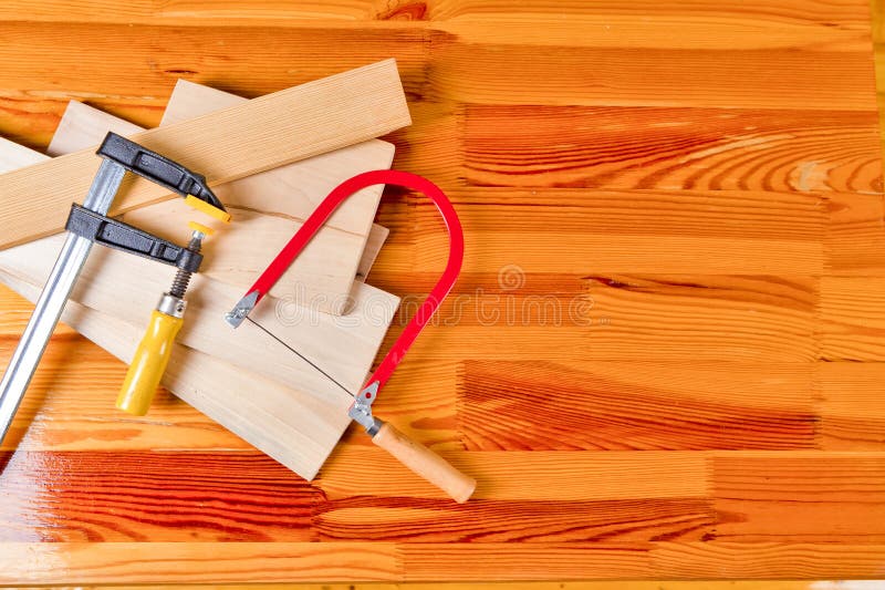 Separate Lineup of Assorted Work Tools on Wood. Horizontal Image ...