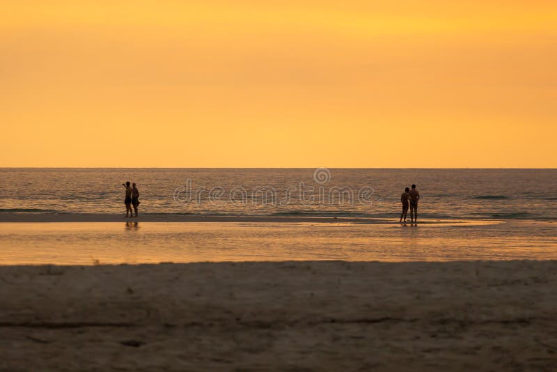 Separate Two Couple Peoples on the Beach at Sunset Stock Image - Image ...