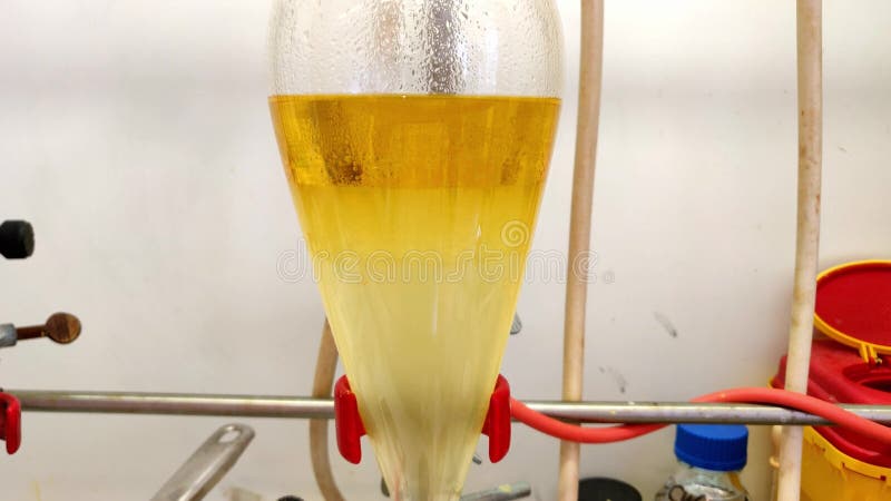 Separation of Organic Layer and Water Layer in Separating Funnel in a ...