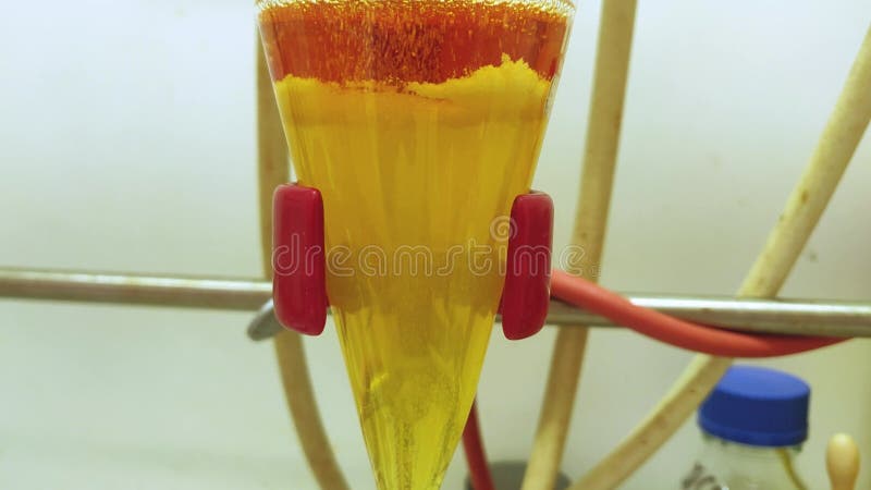 Separation of Organic Layer and Water Layer in Separating Funnel in a ...