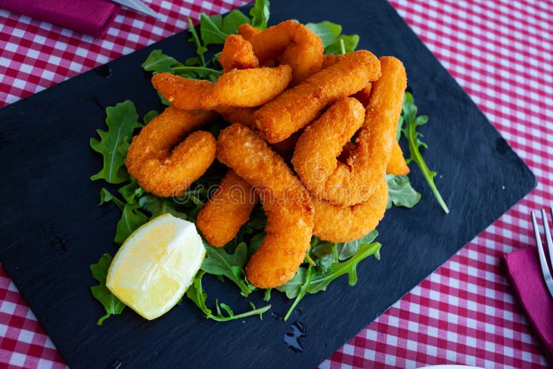 Sepia Breaded and Fried Chocos, Typical Tapa in Spain Stock Image ...