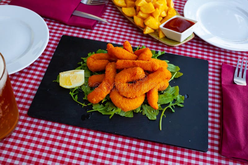 Sepia Breaded and Fried Chocos, Typical Tapa in Spain Stock Photo ...