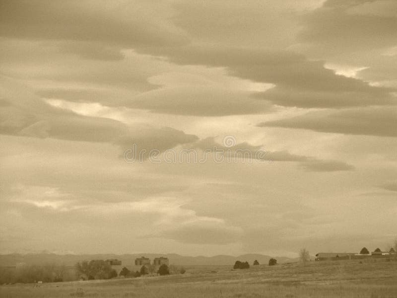 Sepia clouds over field stock photo. Image of space, open - 975862