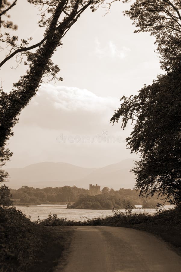 Sepia Ross Castle at the End of a Killarney Forest Path Stock Image ...