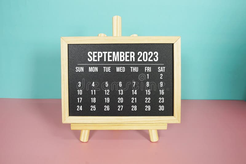 September 2023 Monthly Calendar on Easel Stand on Pink and Blue ...