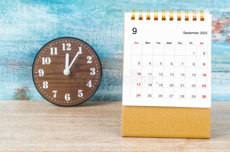 The September 2023 Monthly Desk Calendar for 2023 Year and Clock Stock ...