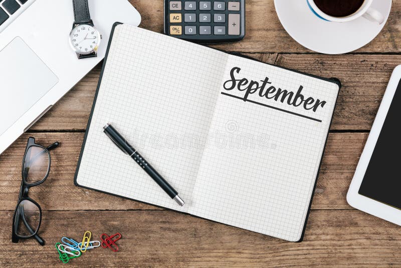 September on Note Book at Office Desktop Stock Photo - Image of glasses ...