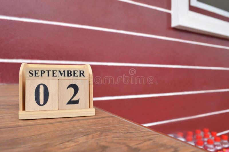 September 02, Number Cube with a Red Wall Background. Stock Photo ...