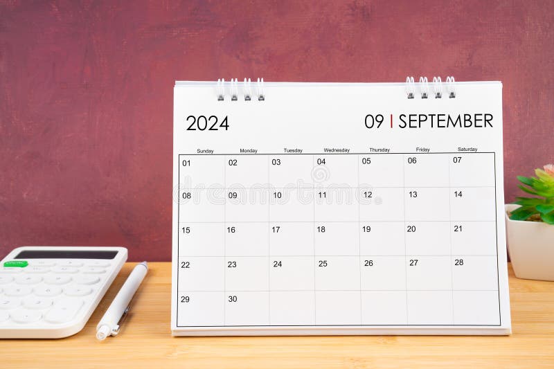 September 2024 White Calendar and Calculator with Pen Stock Image ...