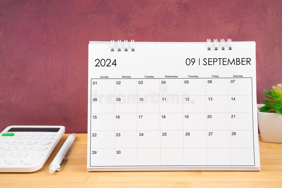 September 2024 White Calendar and Calculator with Pen Stock Image ...