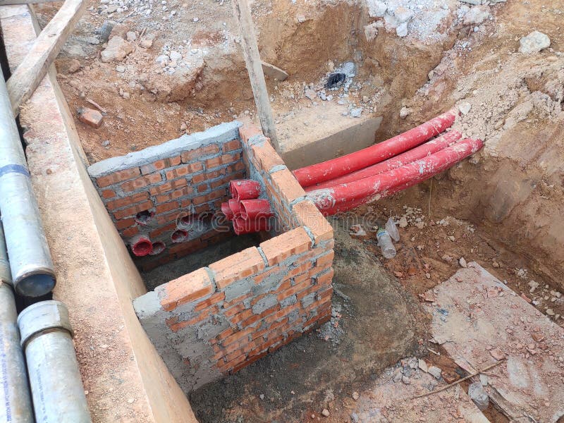Utility Services Manhole Under Construction at the Construction Site ...