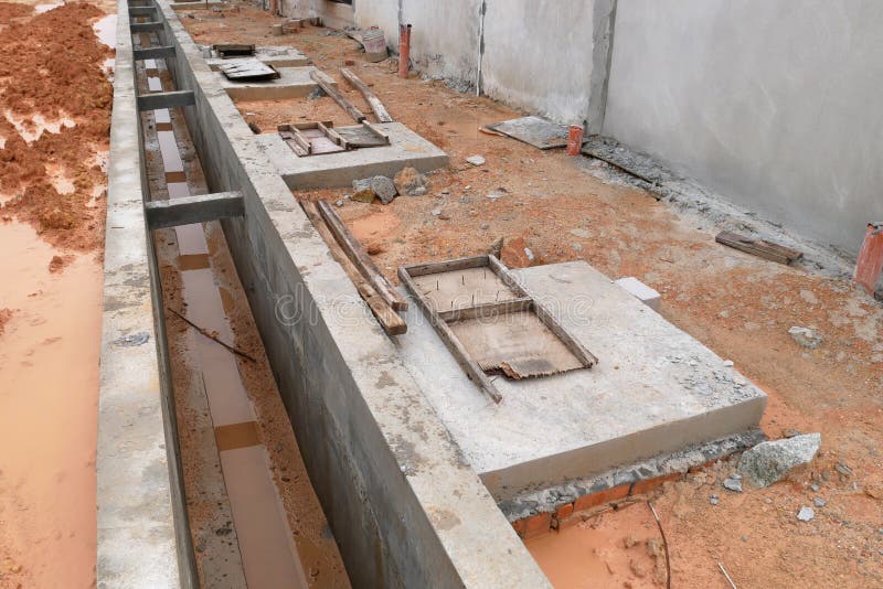 Utility Services Manhole Under Construction at the Construction Site ...