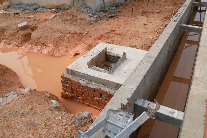 Utility Services Manhole Under Construction at the Construction Site ...