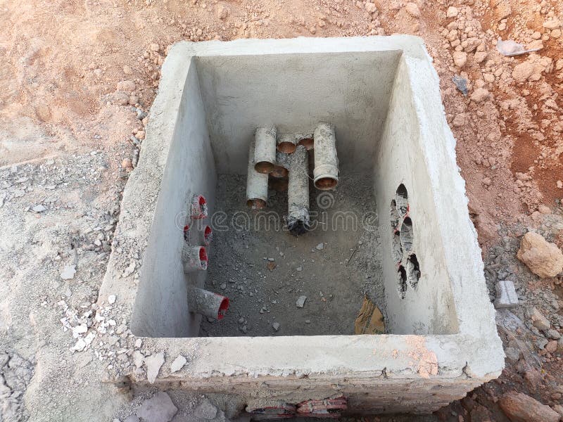 Utility Services Manhole Under Construction at the Construction Site ...