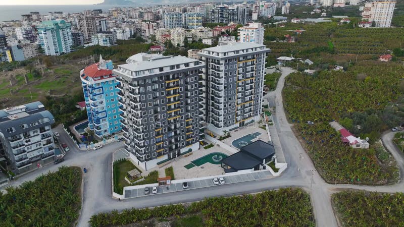 Aerial Video Dramatic Cloudy Sky Behind a Modern Complex Facade ...