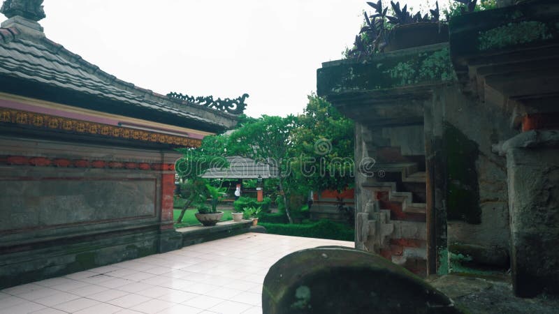 Serene Balinese Temple Architecture and Greenery Stock Footage - Video ...