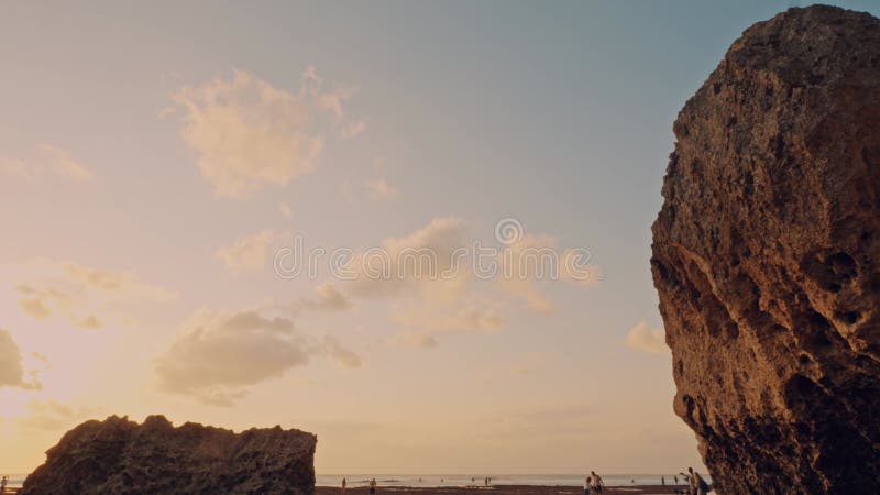 Serene Beach with Rocky Formations and Green Moss Stock Footage - Video ...