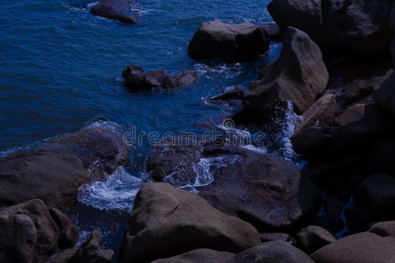 A Blue Body of Water with a Shoreline Surrounded by White Sand: Dead ...
