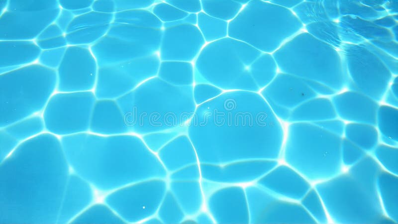 Bright Blue Water Surface with Soothing Sunlight Patterns Stock Photo ...