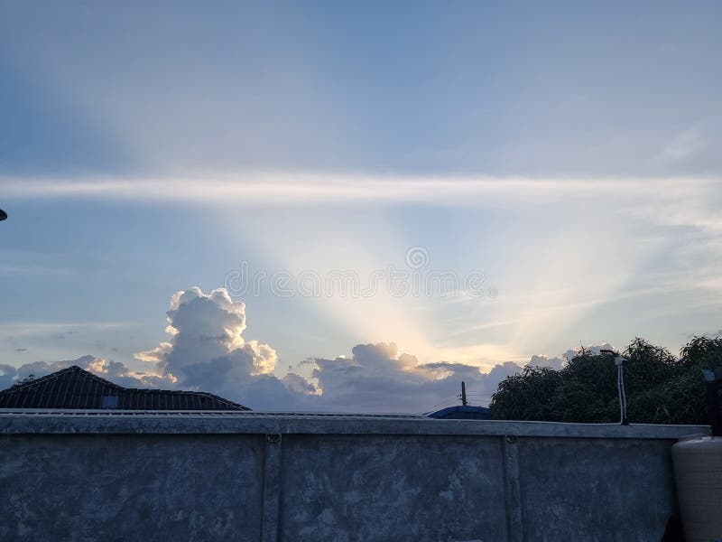 Twilight Sky with Radiant Cloud Breaks. Stock Image - Image of ...