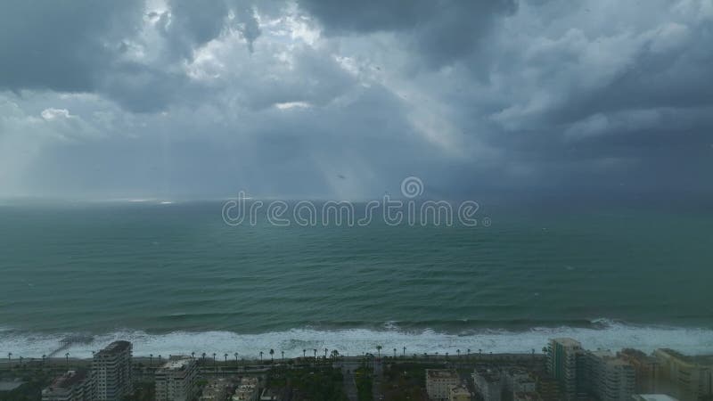 Aerial Video: Stormy Waves with Dramatic Clouds and Radiant Sunlight ...
