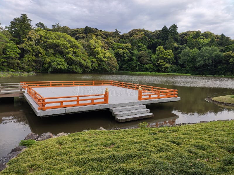 Floating Platform on a Lake with a Forest Backdrop in an Urban Japanese ...