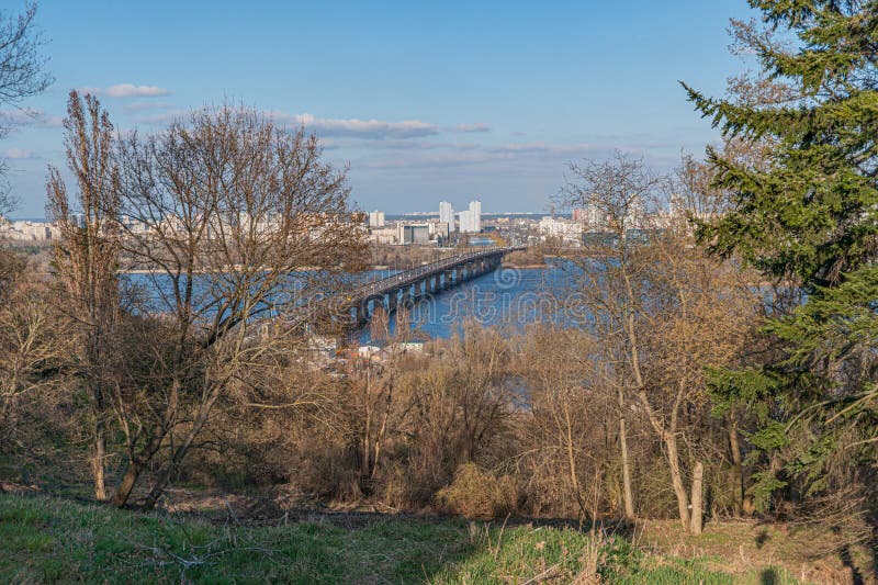 A Serene Landscape Photograph Featuring a River Flowing through ...