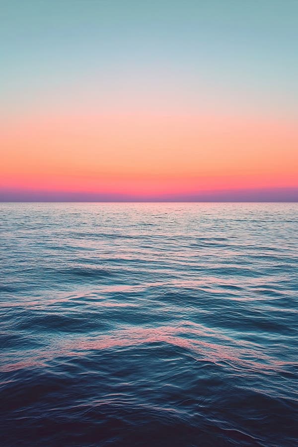 Serene Ocean Scene with Gentle Waves and a Stunning Sunset Backdrop ...