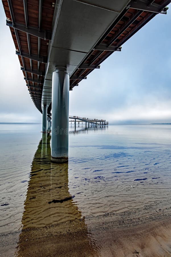 Serene Pier Over Calm Waters Stock Image - Image of peaceful ...