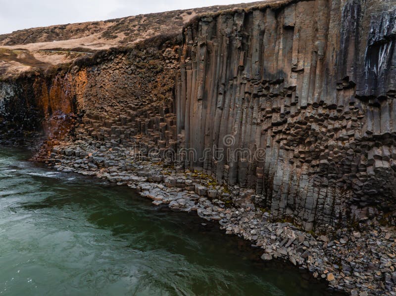 Aerial View of Basalt Columns and Calm River in Icelandic Landscape ...
