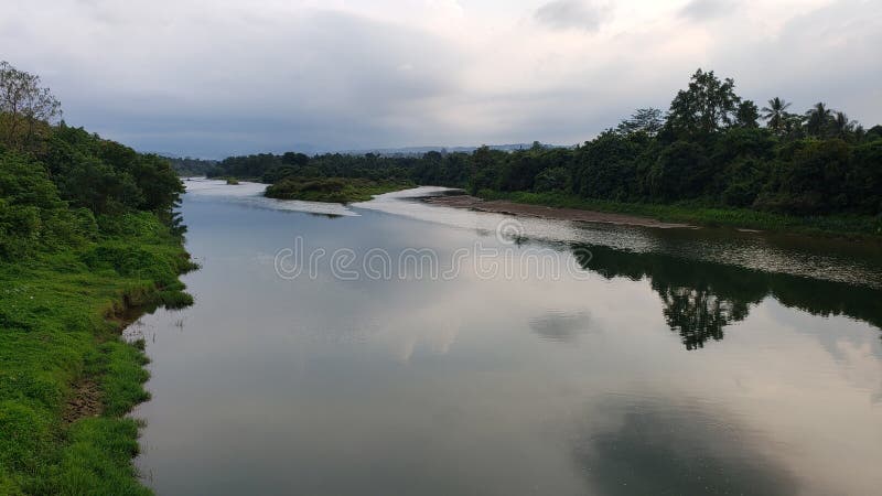 Serene River Landscape with Lush Greenery Stock Image - Image of ...
