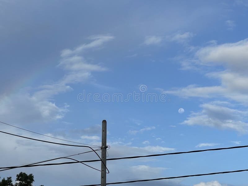 Faint Rainbow and Full Moon Under the Blue Sky Stock Image - Image of ...