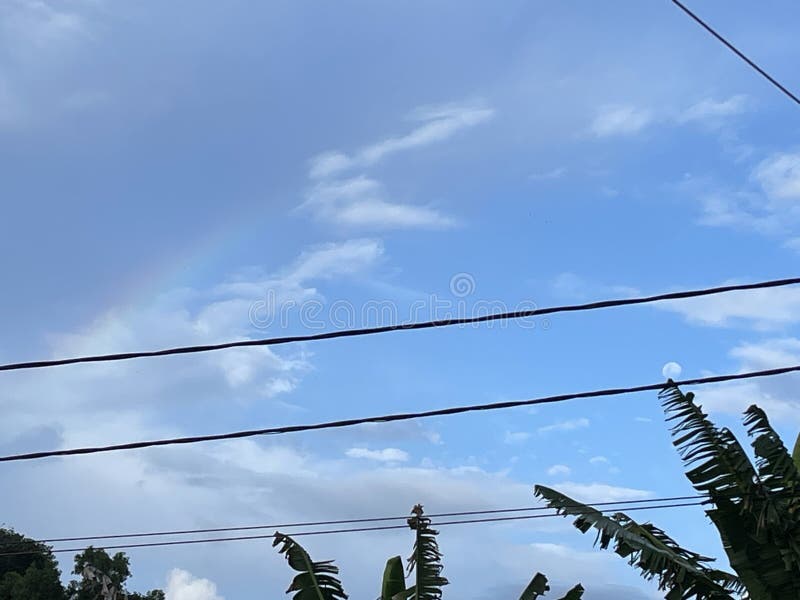 Faint Rainbow and Full Moon Under the Blue Sky Stock Image - Image of ...