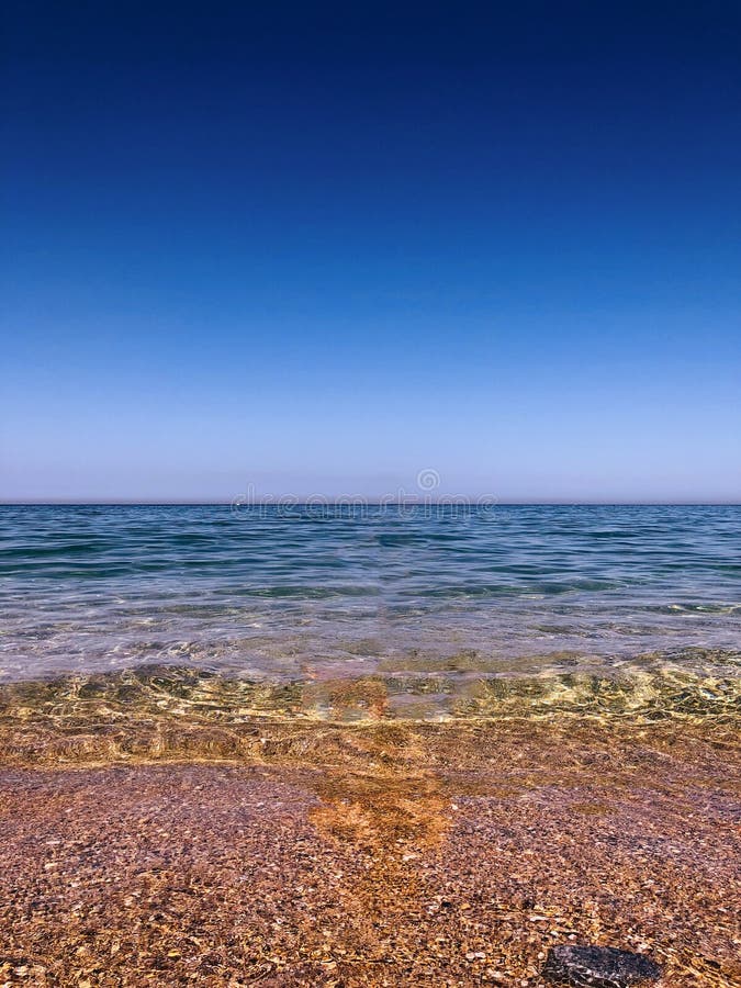 Serene Sea Clear Waters a Tranquil, Mirror-like Reflection Stock Photo ...