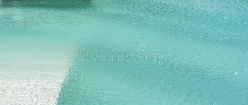 The Serene Surface of Turquoise Water, with Gentle Ripples and a Clear ...