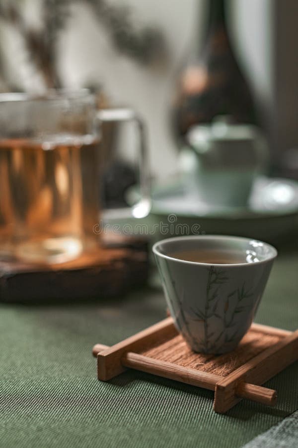 An Elegant Tea Ceremony Setup Featuring a Traditional Teacup and ...