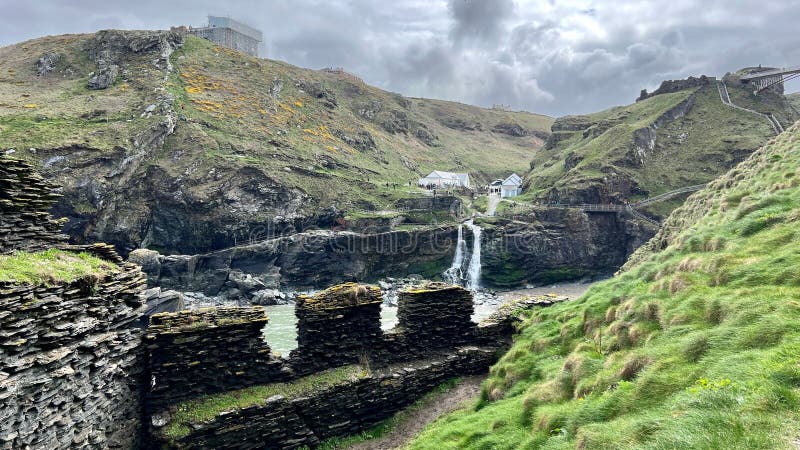 Serene View of a Beach with Clear Blue Ocean Water and Rocky Shoreline ...